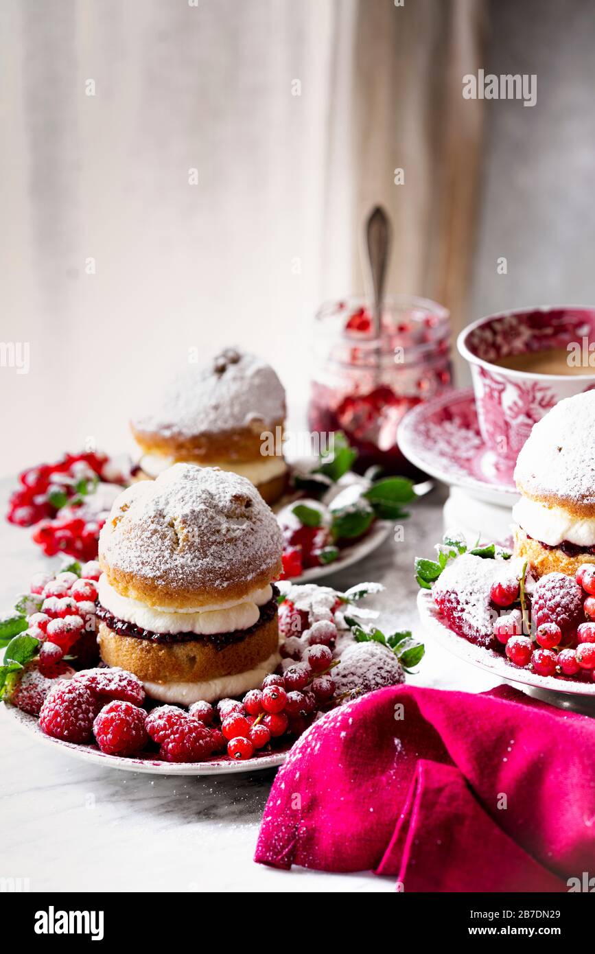 Victoria Sponge Cake with raspberry jam and whipped cream , generously ...