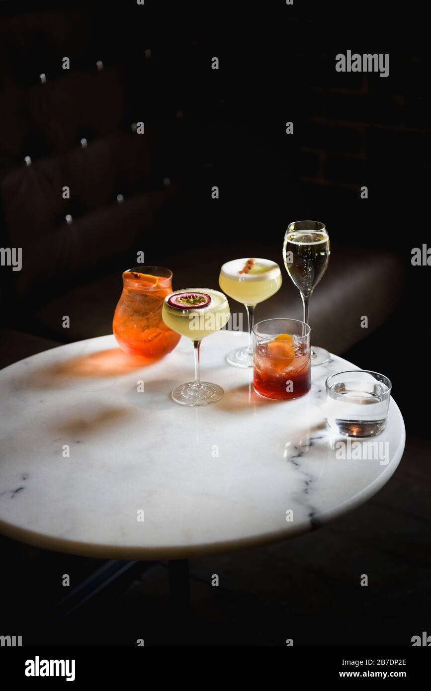 Cocktails on a table in a bar Stock Photo - Alamy