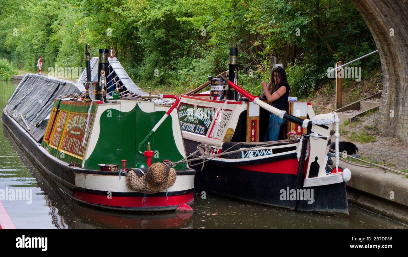 Working narrowboats, Motor and Butty moored on the Grand Union Canal ...