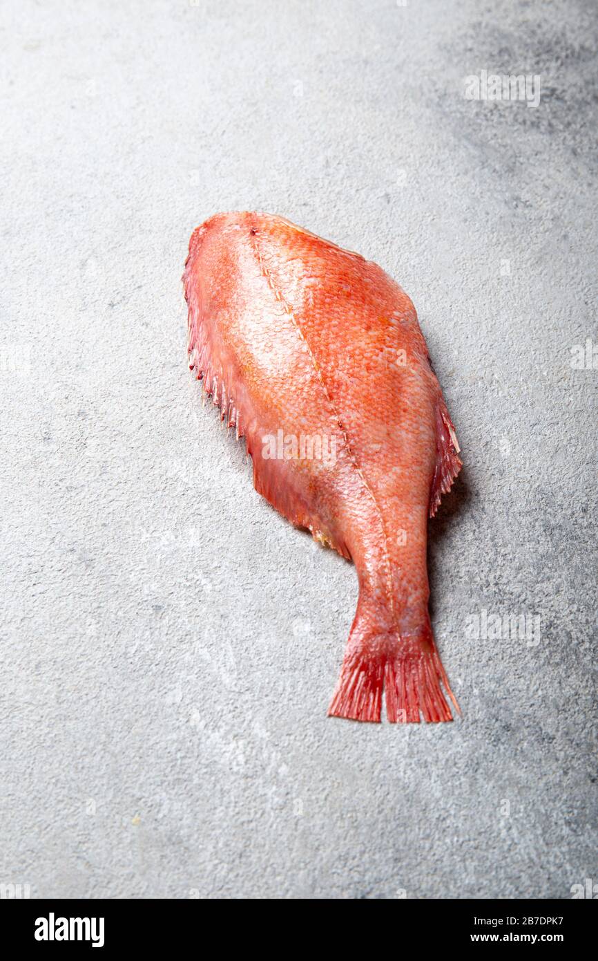 Fresh red raw seabass Stock Photo - Alamy