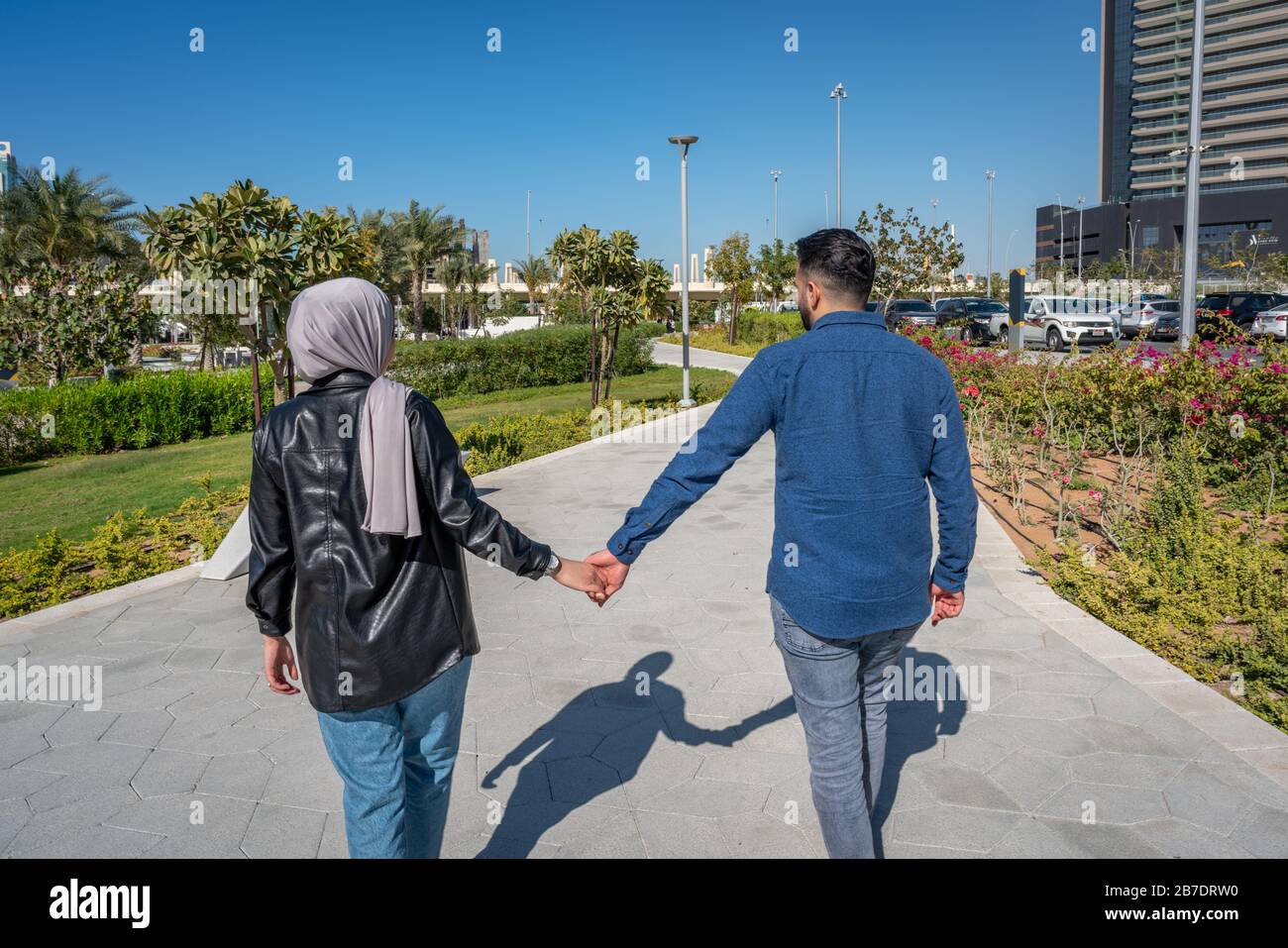 Muslim Couple Walking 25 Pair Of Muslim Veiled Stock Photos, High Res