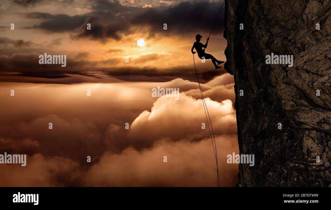 Rappelling cliff silhouette hi-res stock photography and images - Alamy