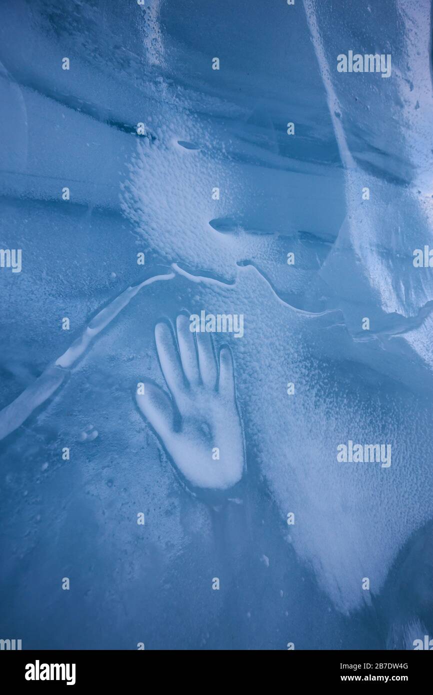 Human Hand Imprint on the Ice Wall in the Natural Cave during winter ...