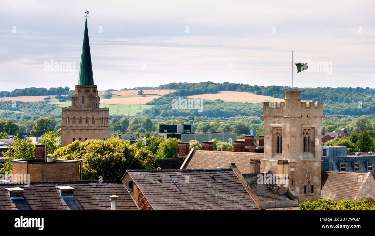 Spire and Turret of buildings with hills in background, Oxford ...