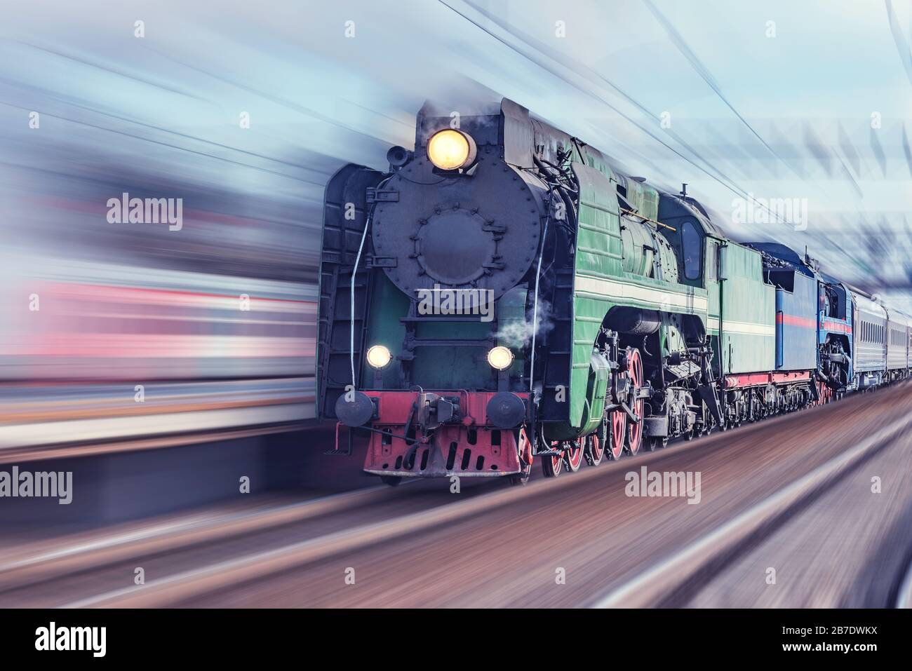 Train moves through railway station hi-res stock photography and images ...