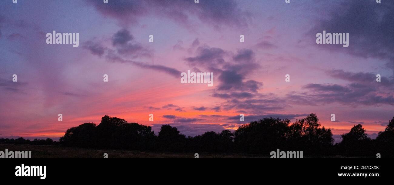 Colourful Sunset in NZ Stock Photo - Alamy
