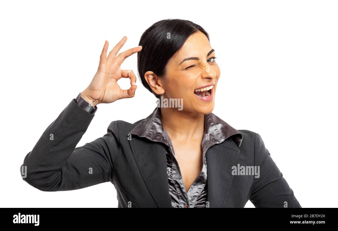 Woman making the ok sign isolated on white Stock Photo - Alamy