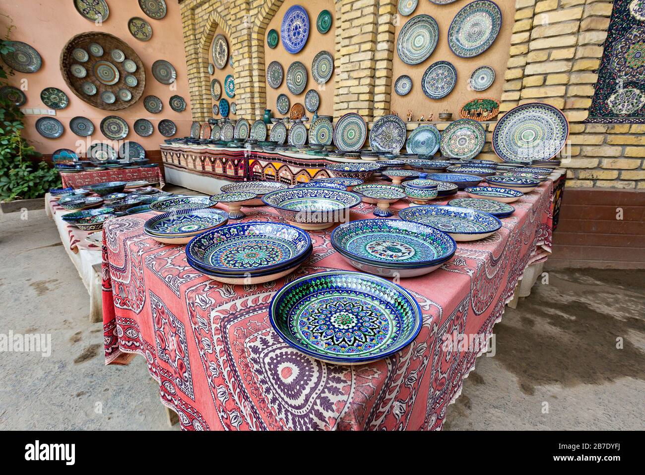 Pottery shop with ceramic plates, in Rishtan, Uzbekistan Stock Photo ...