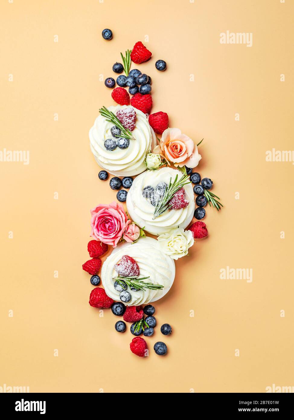 Beautiful creative layout of mini pavlova cakes in top view. Mini ...