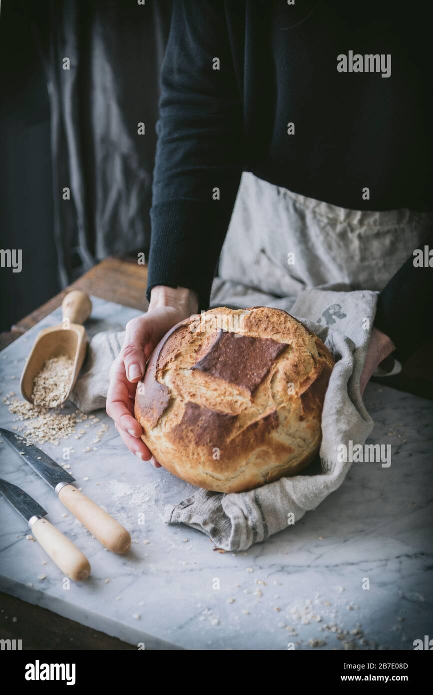 Preparing a loaf of bread at home Stock Photo - Alamy