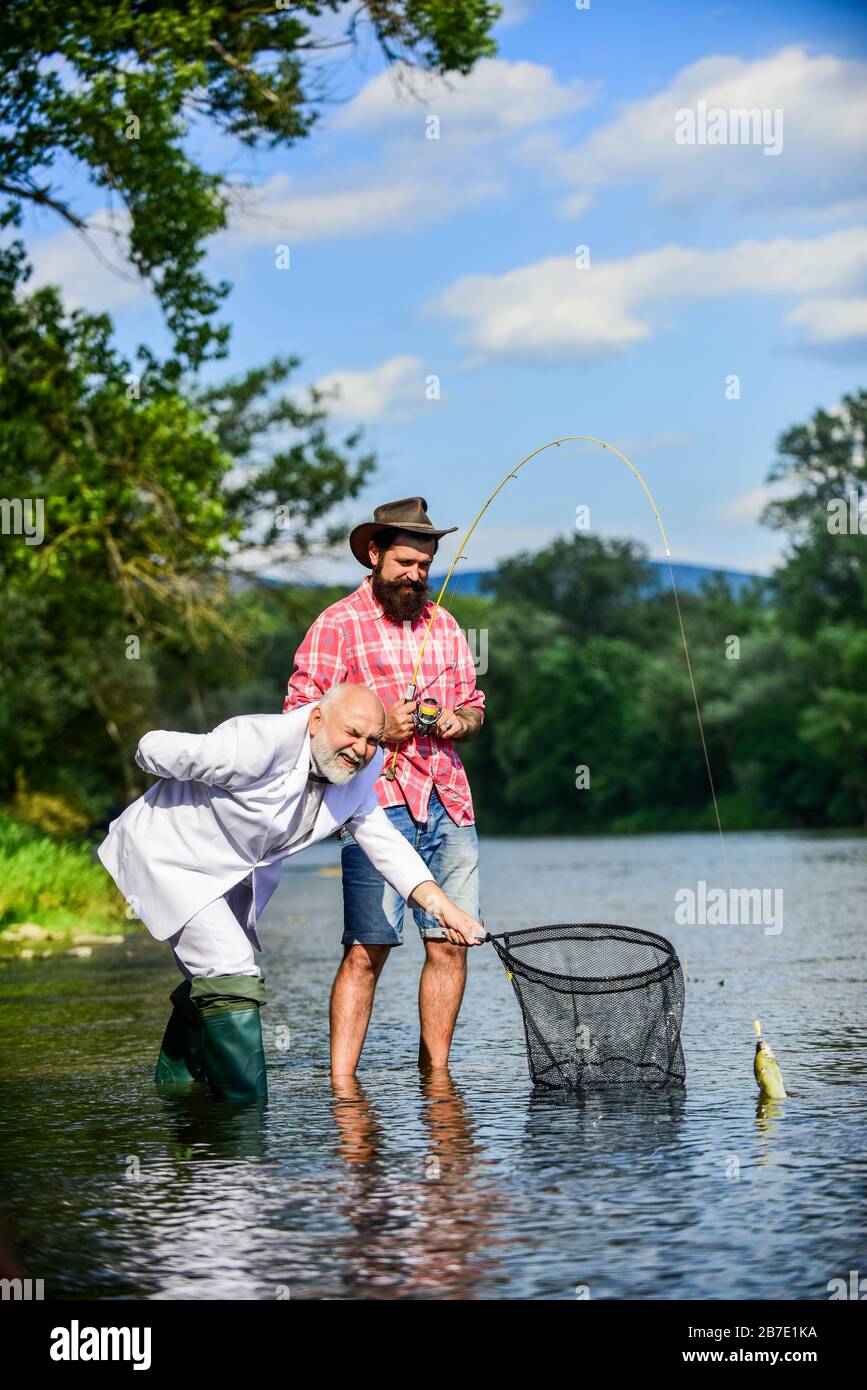 Retired fishermen and their families hi-res stock photography and ...