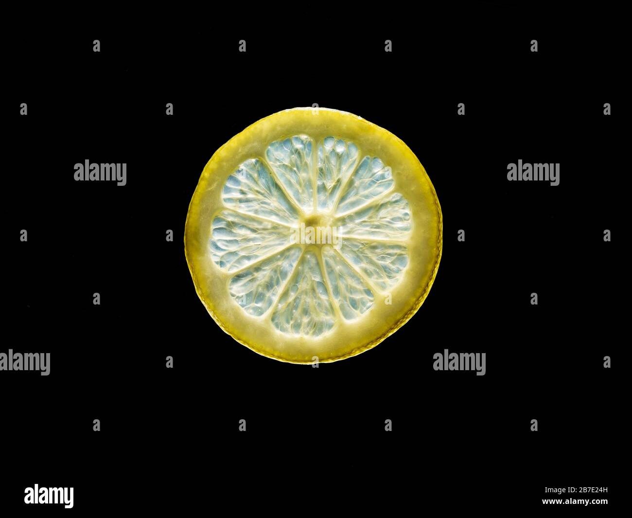 Backlit portrait of a lemon slice Stock Photo - Alamy