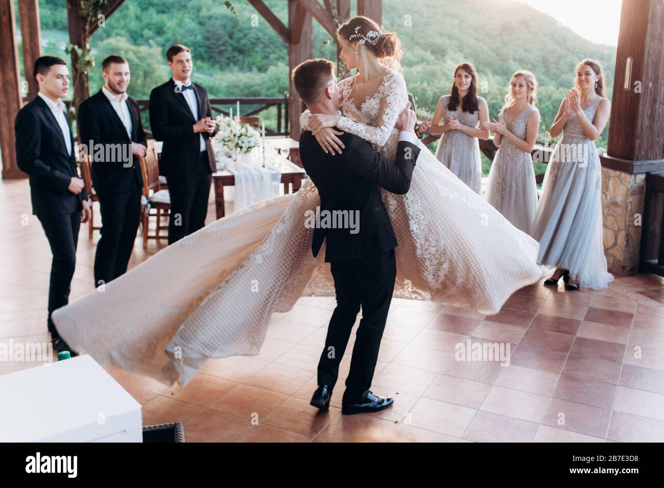 The first dance of the young. The bride and groom are dancing their ...