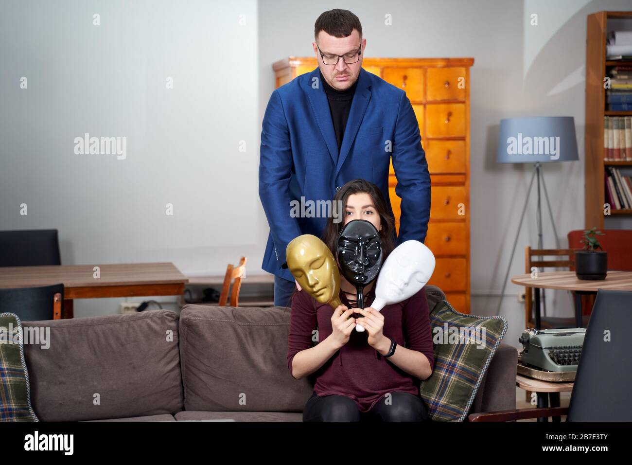Therapist using plastic masks with female patient during therapy ...