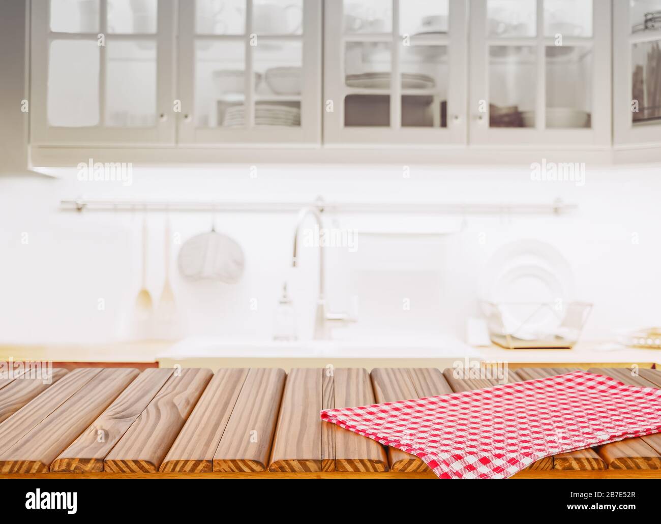 Wood table top on blurred kitchen background Stock Photo - Alamy