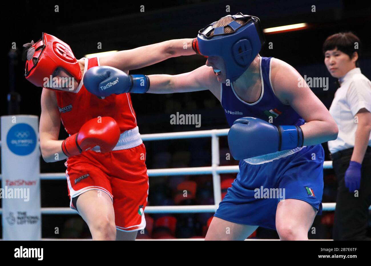 Ireland's Christina Desmond (blue) in action against Italy's Angela ...