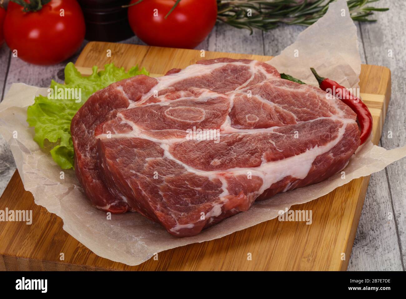 Raw pork neck steak ready for cooking Stock Photo - Alamy