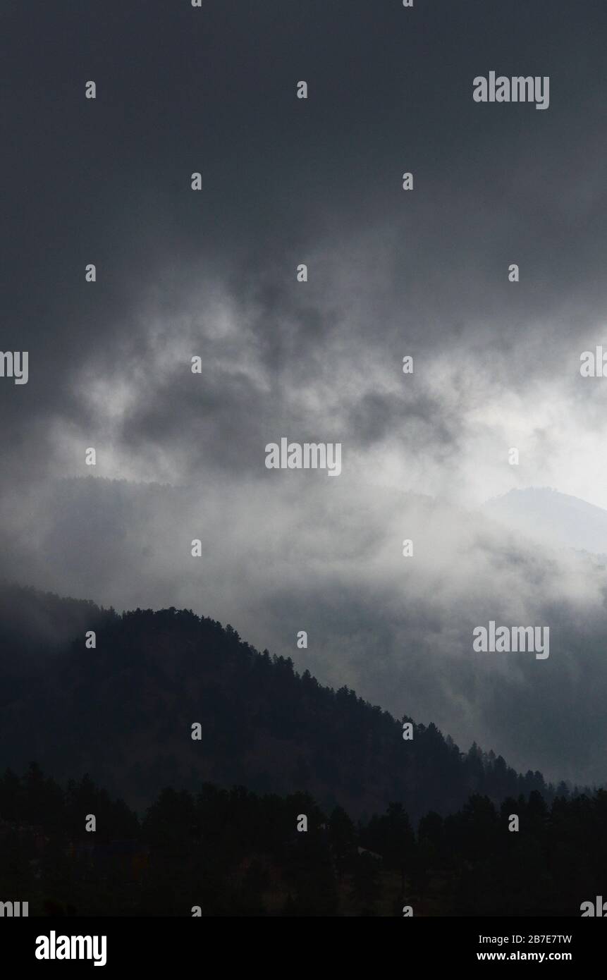 Storm coming in over mountains to the North Stock Photo - Alamy