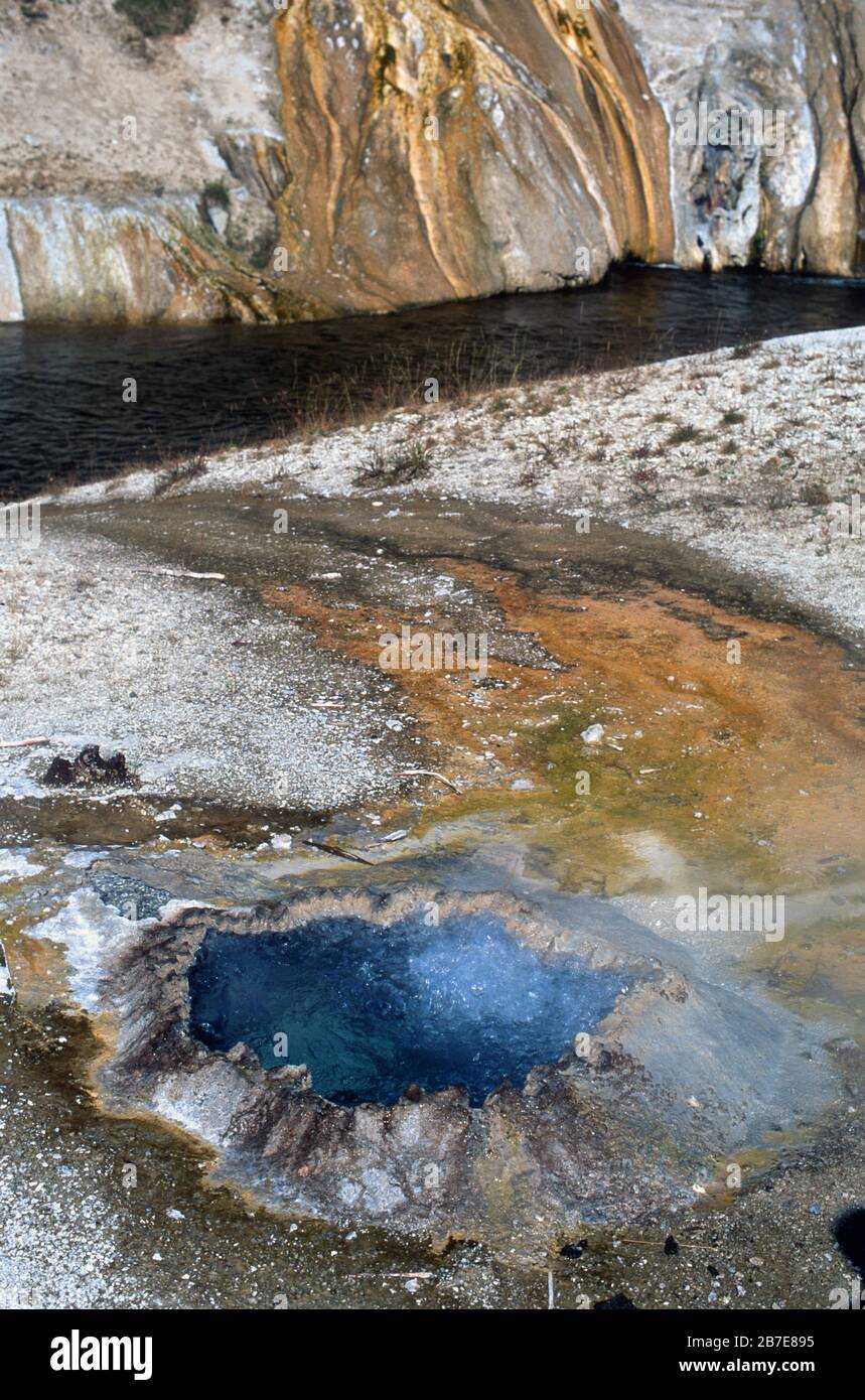 This is a rarely active geyser. Colors come form bacteria and other ...