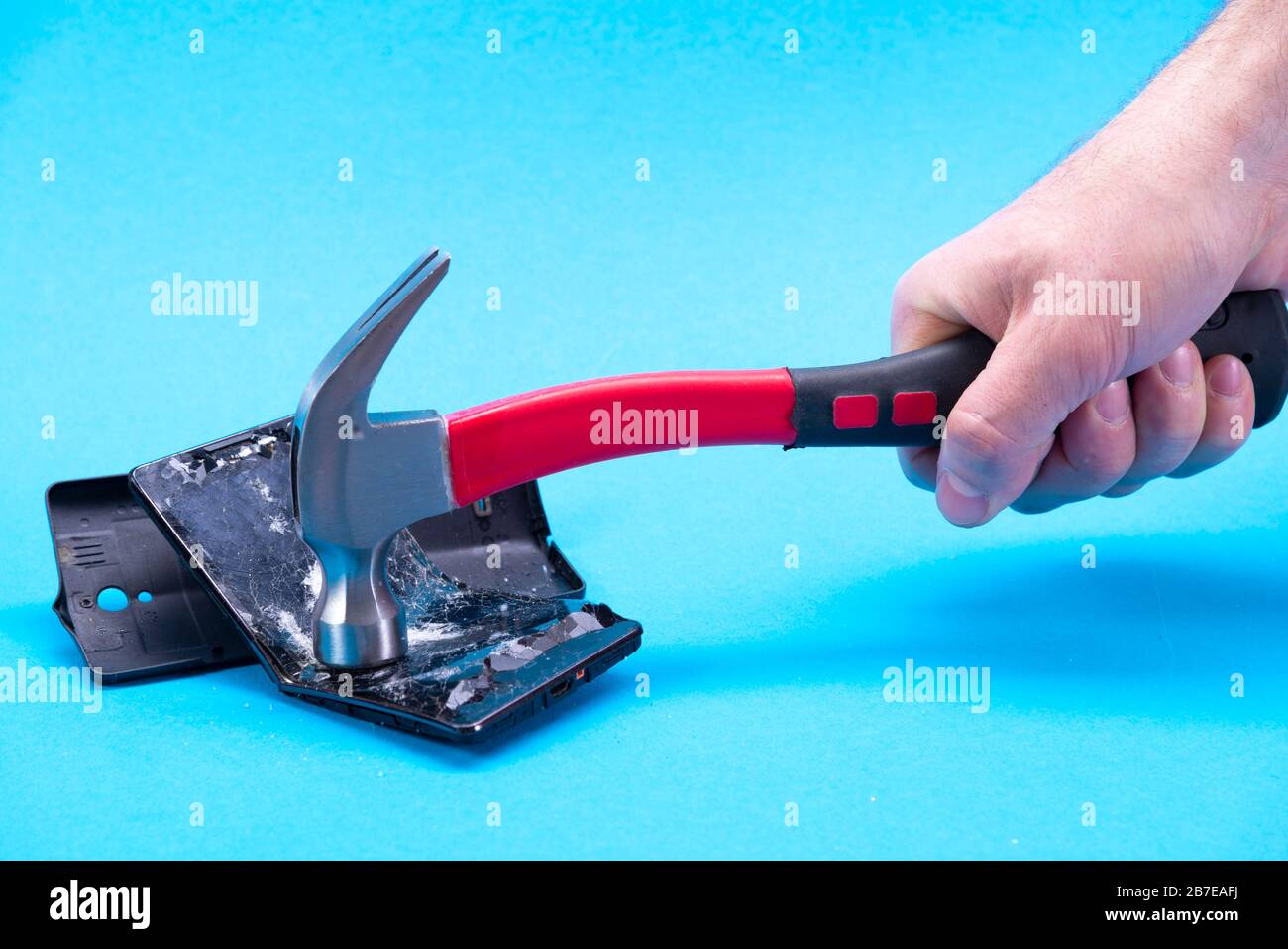 Old broken mobile phone hammer hi-res stock photography and images - Alamy