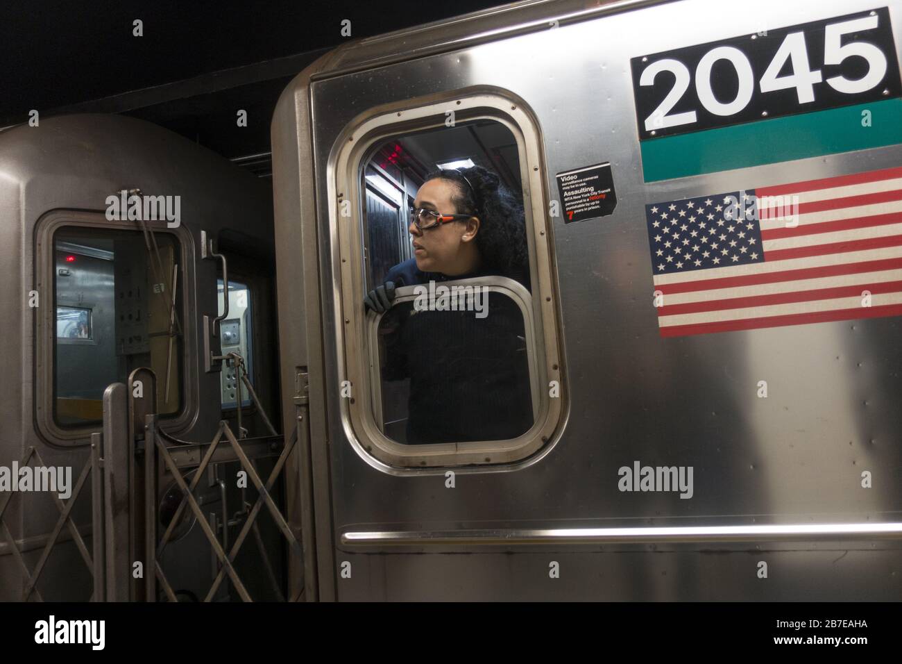 Subway train conductor in the station at Grand Central/42nd Street in ...