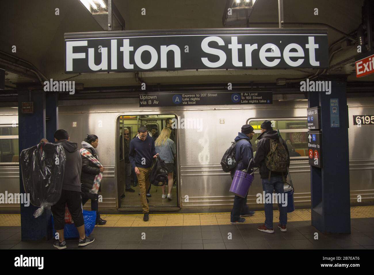 Subway train in the Fulton Street Station in the financial district in ...