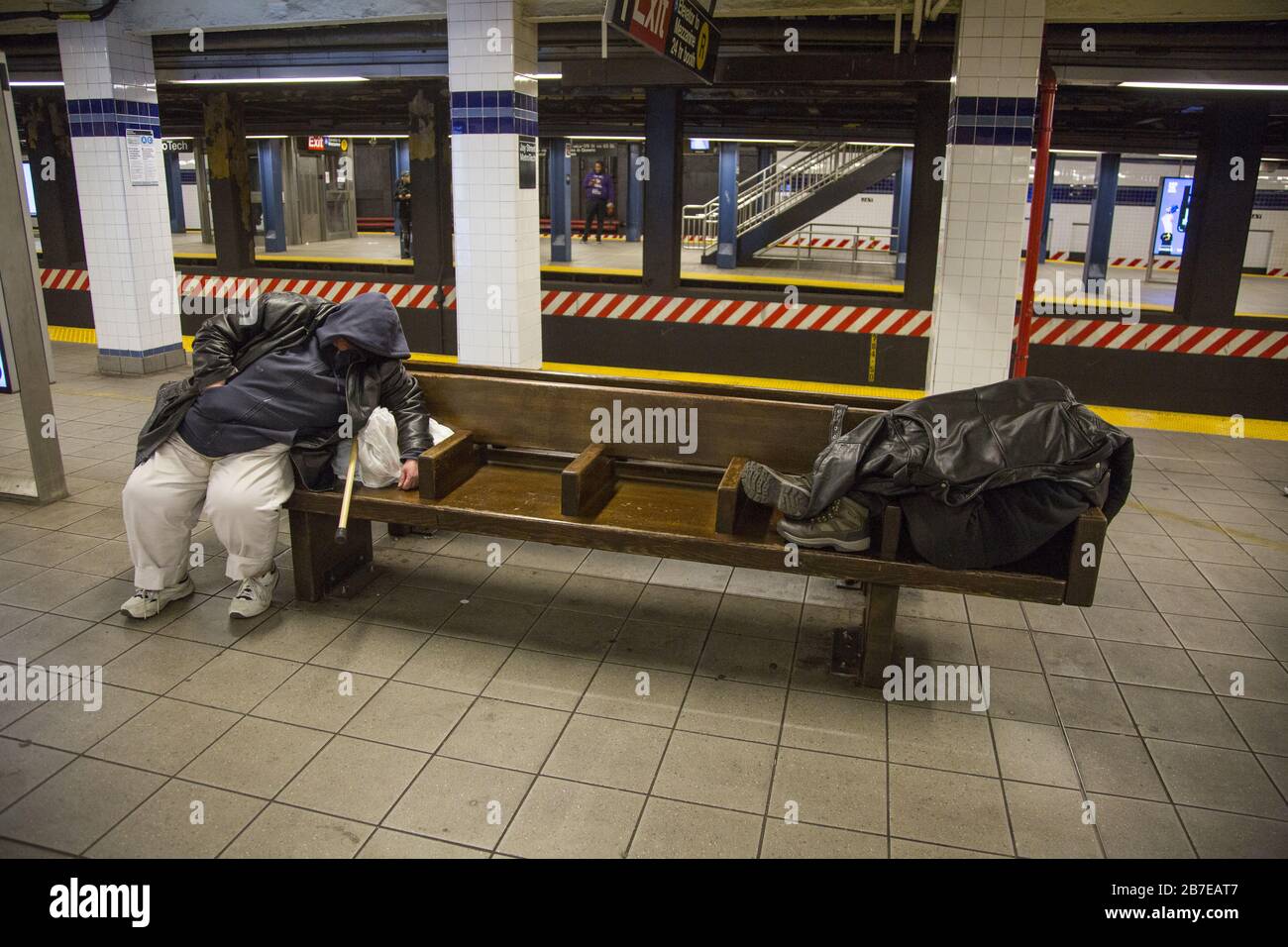 Many homeless people in New York City take refuge in subway stations to ...