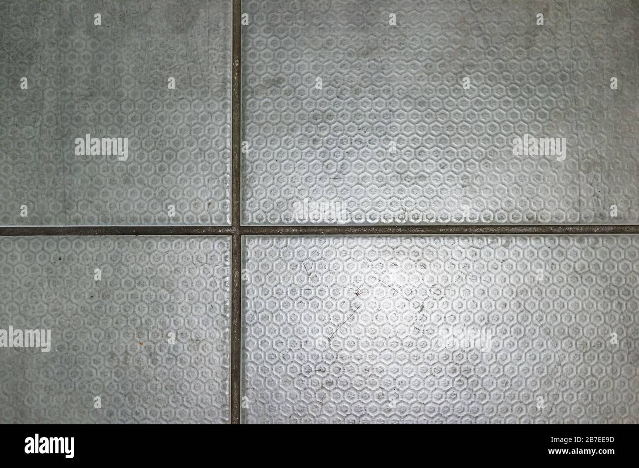 Overhead shot of a steel floor with light reflecting off it Stock Photo ...