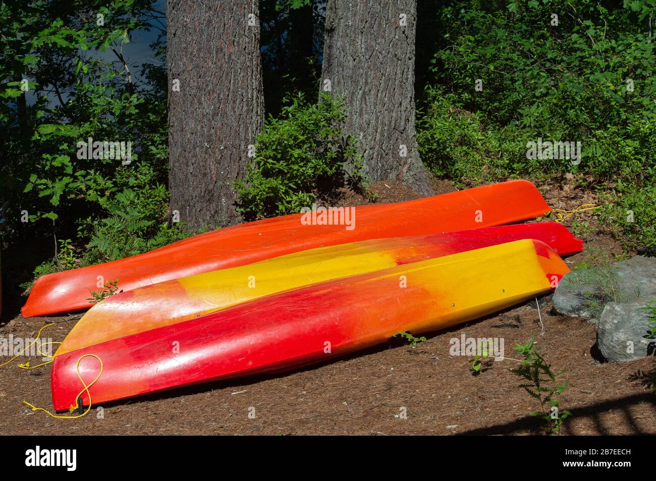 Orange and yellow kayaks hi-res stock photography and images - Alamy