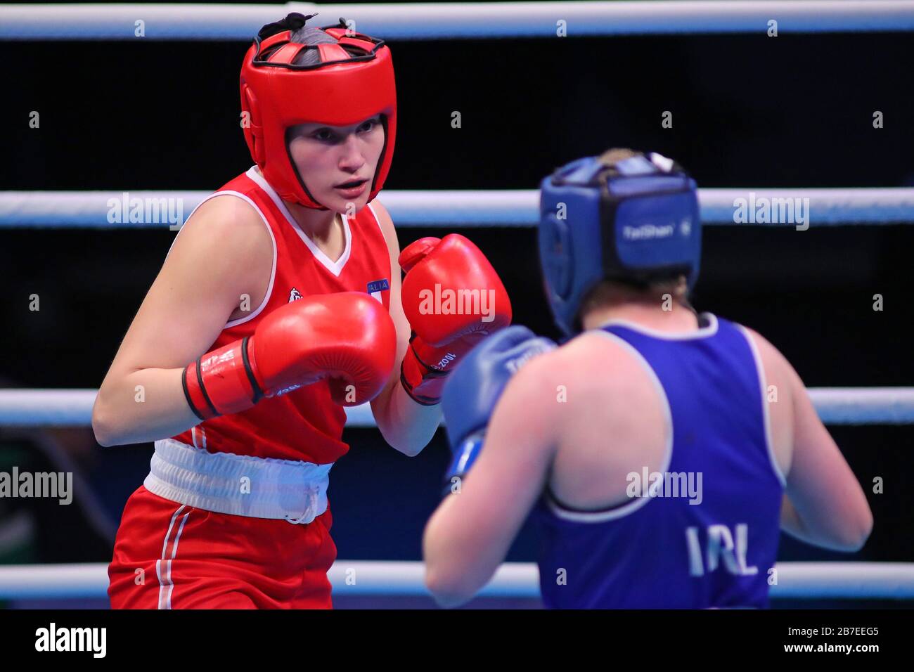 Angela Carini of Italy, wearing red and Christina Desmond of Ireland ...