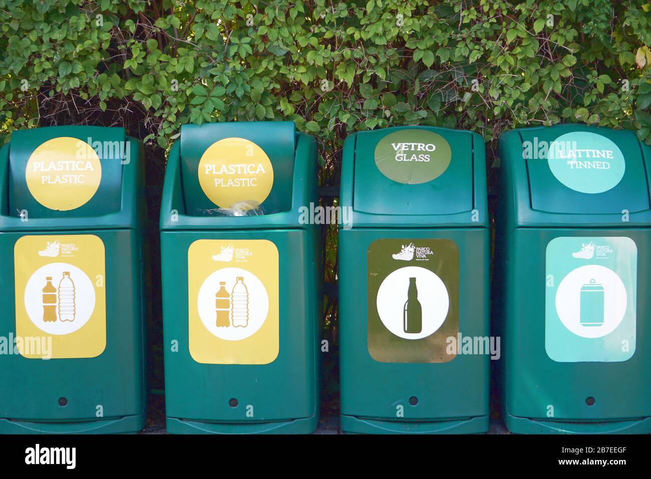 Waste management signs and symbols on a garbage bin Stock Photo - Alamy