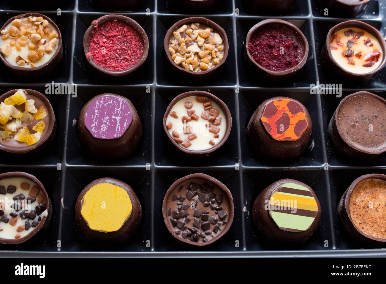 Various of sweet confectionery with chocolate candies and pralines ...