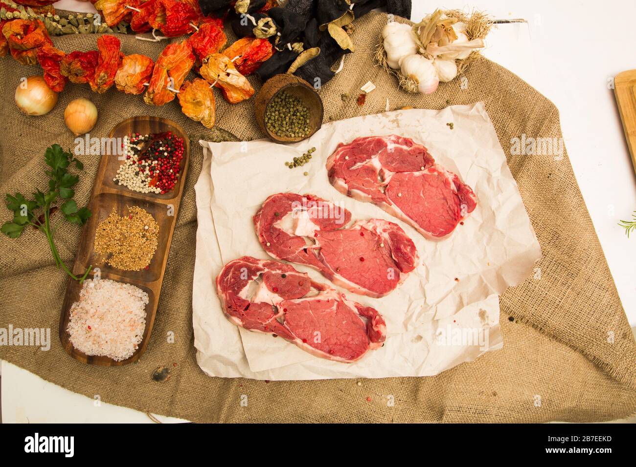 Raw meat on board Stock Photo - Alamy