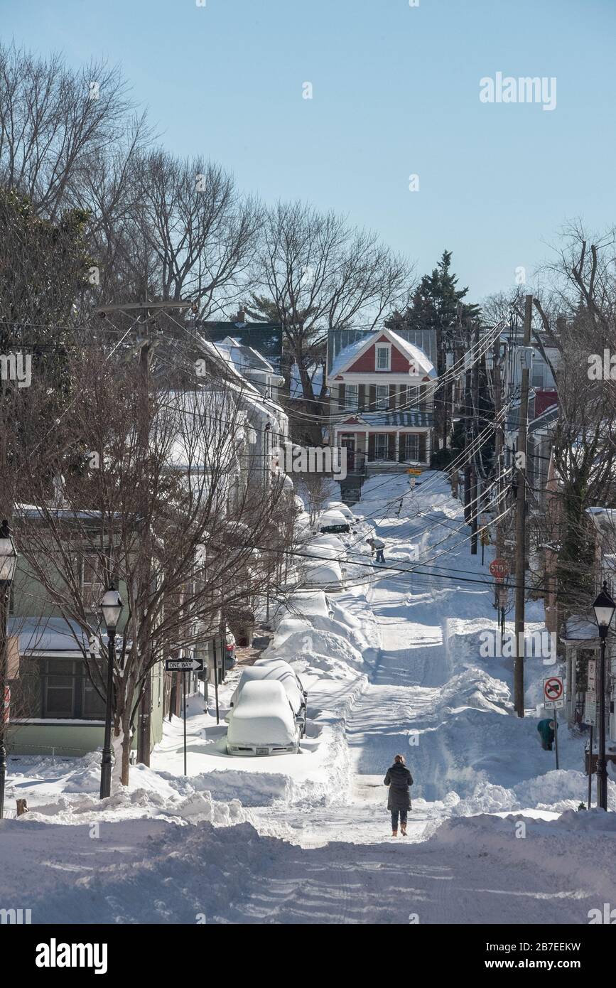 Annapolis street scene on sunny day following blizzard with snow piled ...