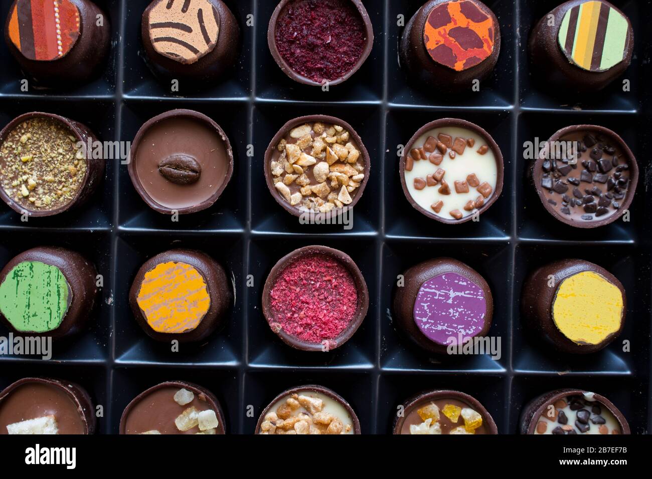 Various of sweet confectionery with chocolate candies and pralines ...