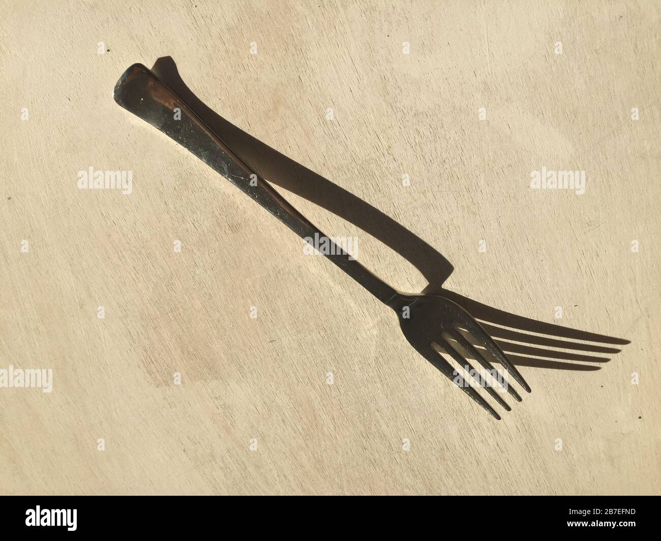 Cast shadow fork hi-res stock photography and images - Alamy