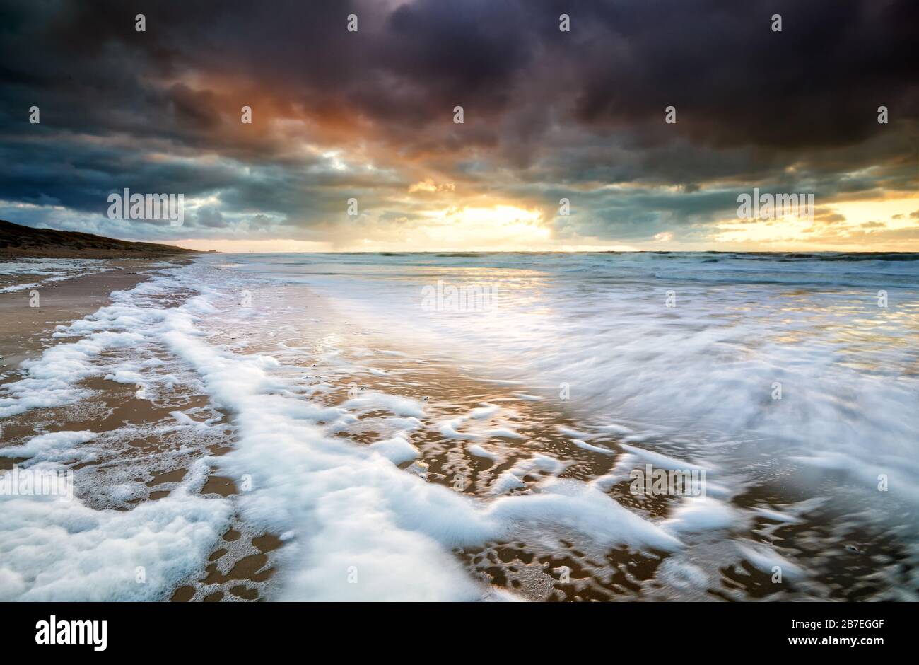 dramatic sunset on north sea during heavy storm Stock Photo - Alamy