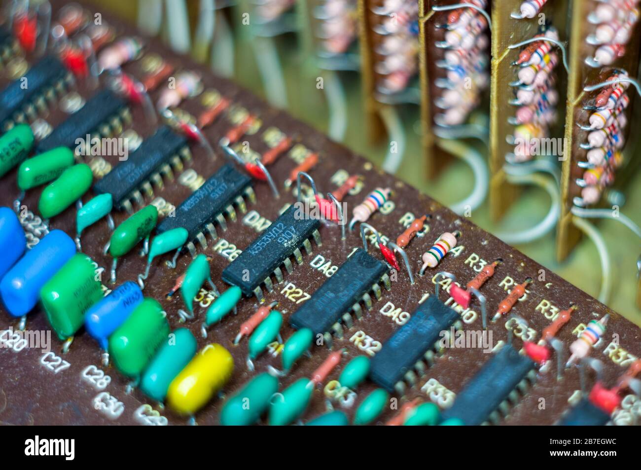 Vintage electronic circuit boards with radio parts and chips, close-up ...