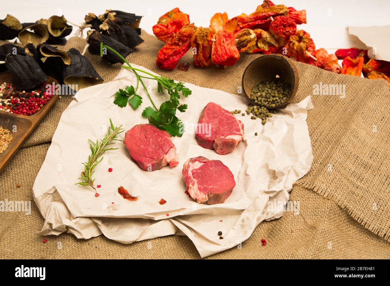 Raw meat on board Stock Photo - Alamy