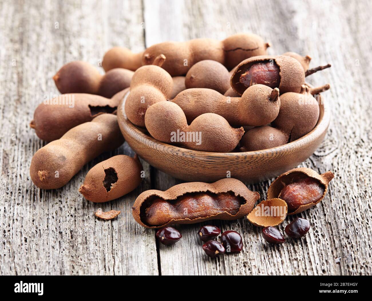 Tamarind fruit with seeds Stock Photo - Alamy