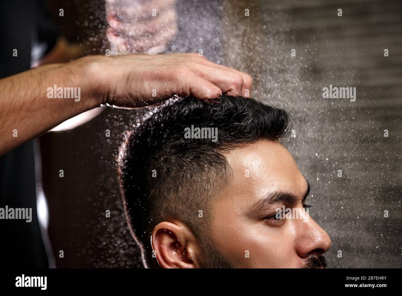 Indian man styling hair hi-res stock photography and images - Alamy