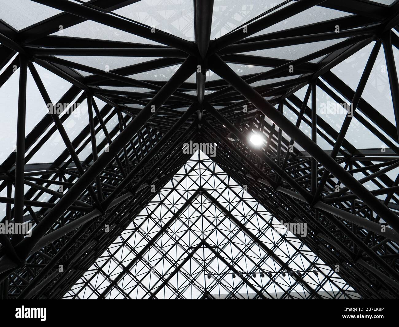 Frog's eye view shot from the base of a tower with iron beams Stock ...