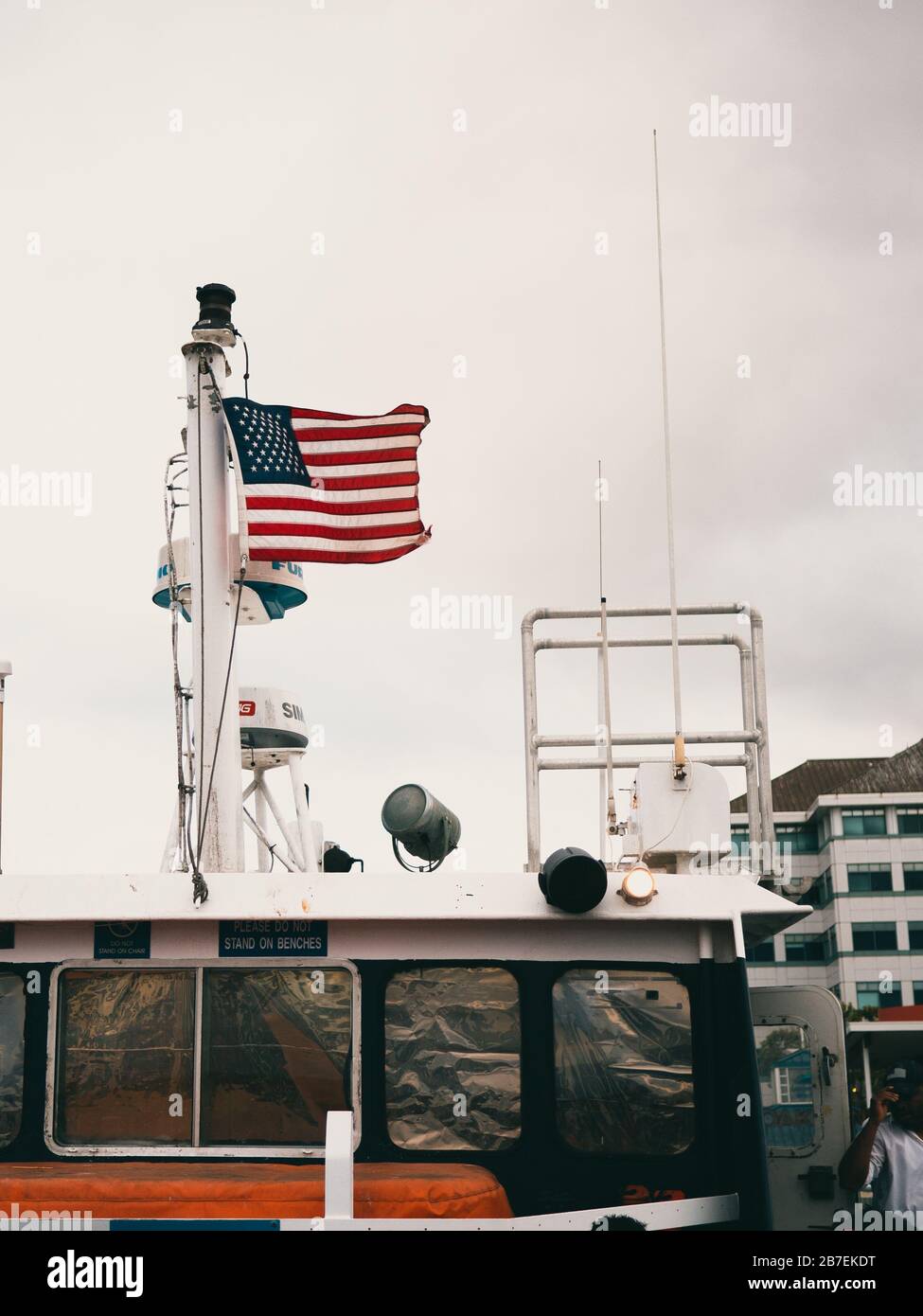 American flag waving on ship hi-res stock photography and images - Alamy