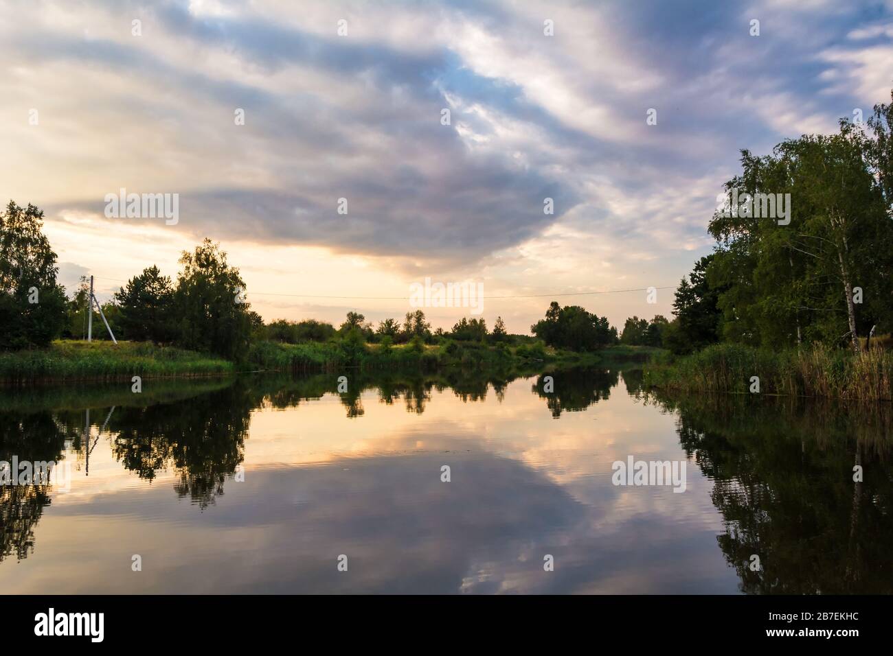 Wonderful evening on the northern lake Stock Photo - Alamy