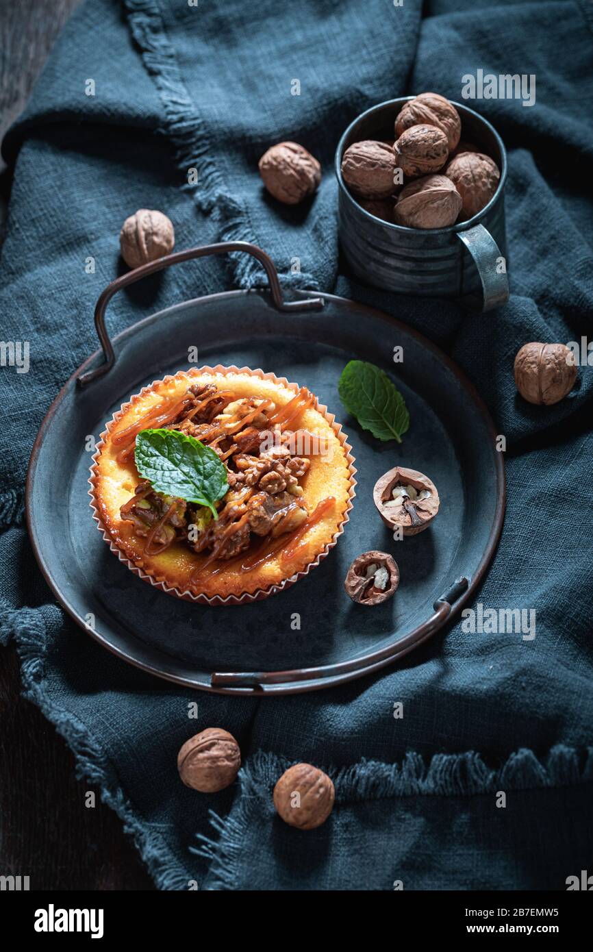 Fresh and sweet walnut cheesecake made nuts and caramel Stock Photo - Alamy
