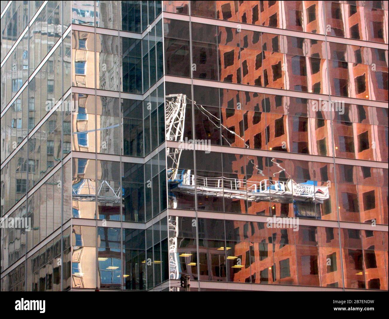 Reflection of the image of the crane on the window Stock Photo - Alamy