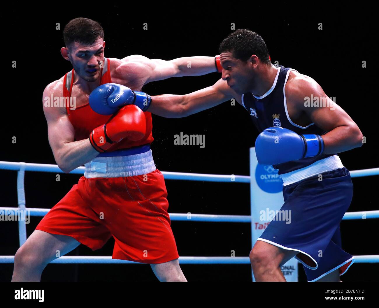 Spain's Enmanuel Reyes Pla (blue) defeats Romania's Cristian-Rizvan ...