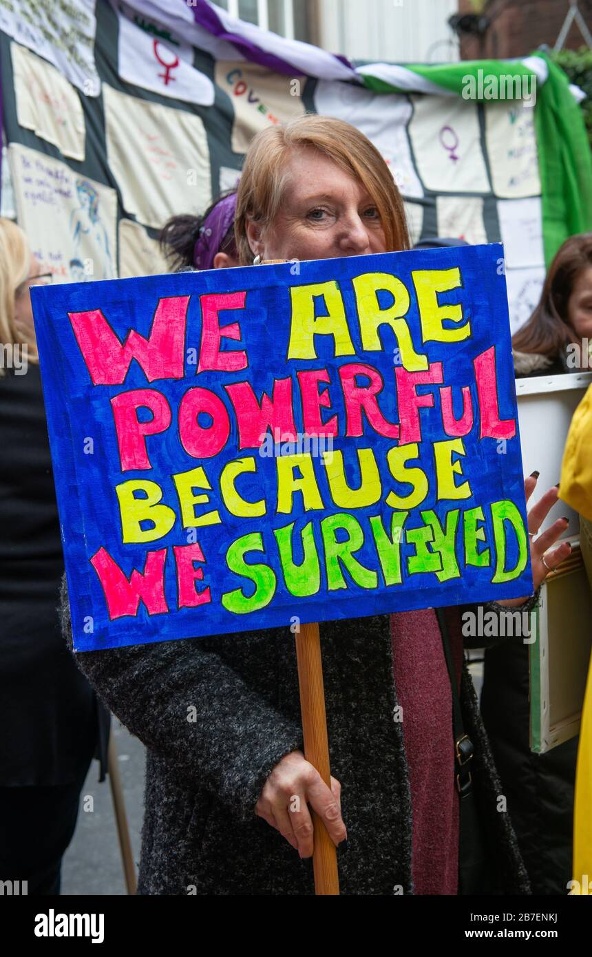 Female protester with banner at the Million Women Rise demonstration in ...