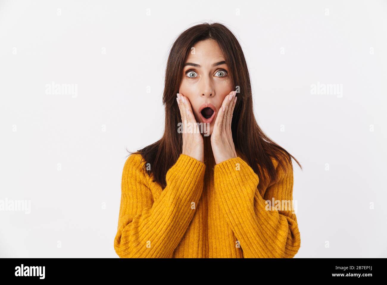 Image of excited brunette adult woman wearing sweater expressing ...