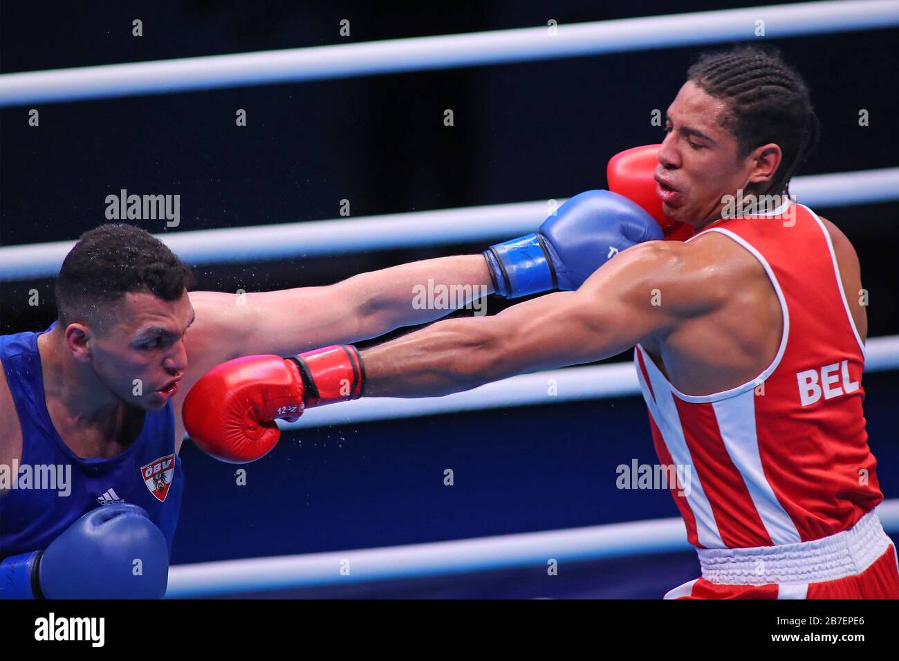 Victor Schelstraete of Belgium, wearing red and Ahmed Hagag of Austria ...